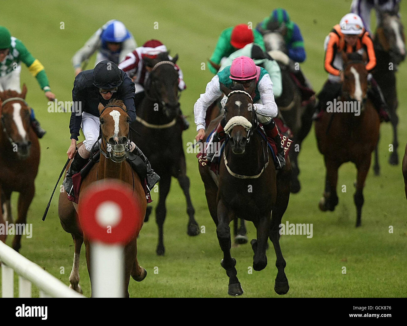 Latin Love under jockey Ryan Moore (left) wins the Kilboy Estate Stakes ...
