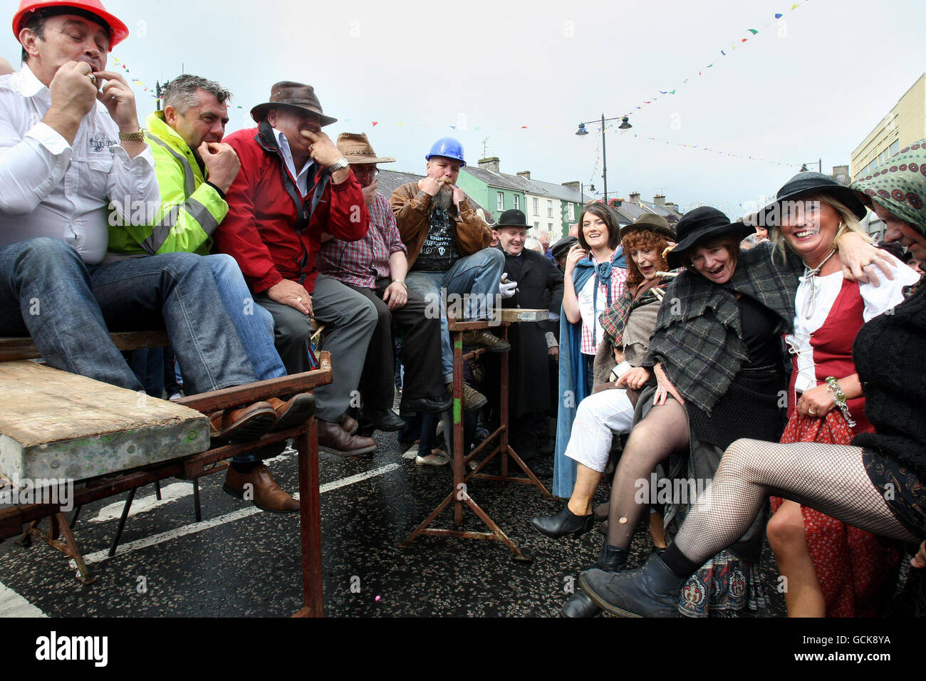 Competitors compete in a wolf whistling competition in Irvinestown Co ...