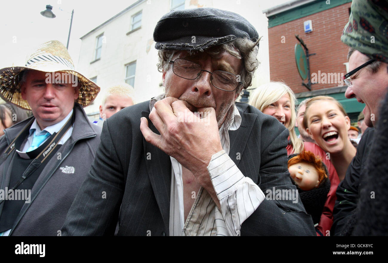 Competitors compete in a wolf whistling competition in Irvinestown Co ...