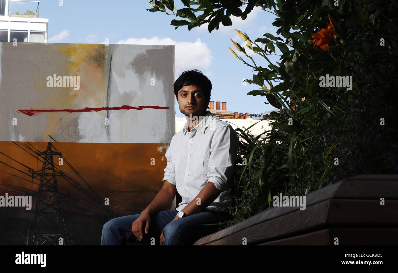 Hammersmith based artist Prinul Patel in front of his work Pylon (ii ...