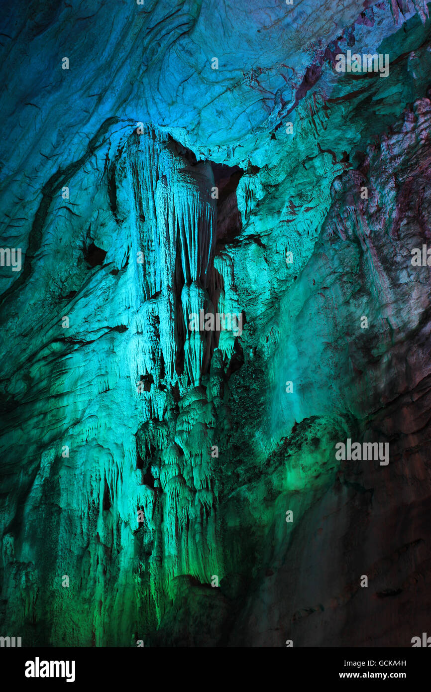 Colorful cave stalactites formation. Close up of colorful natural ...