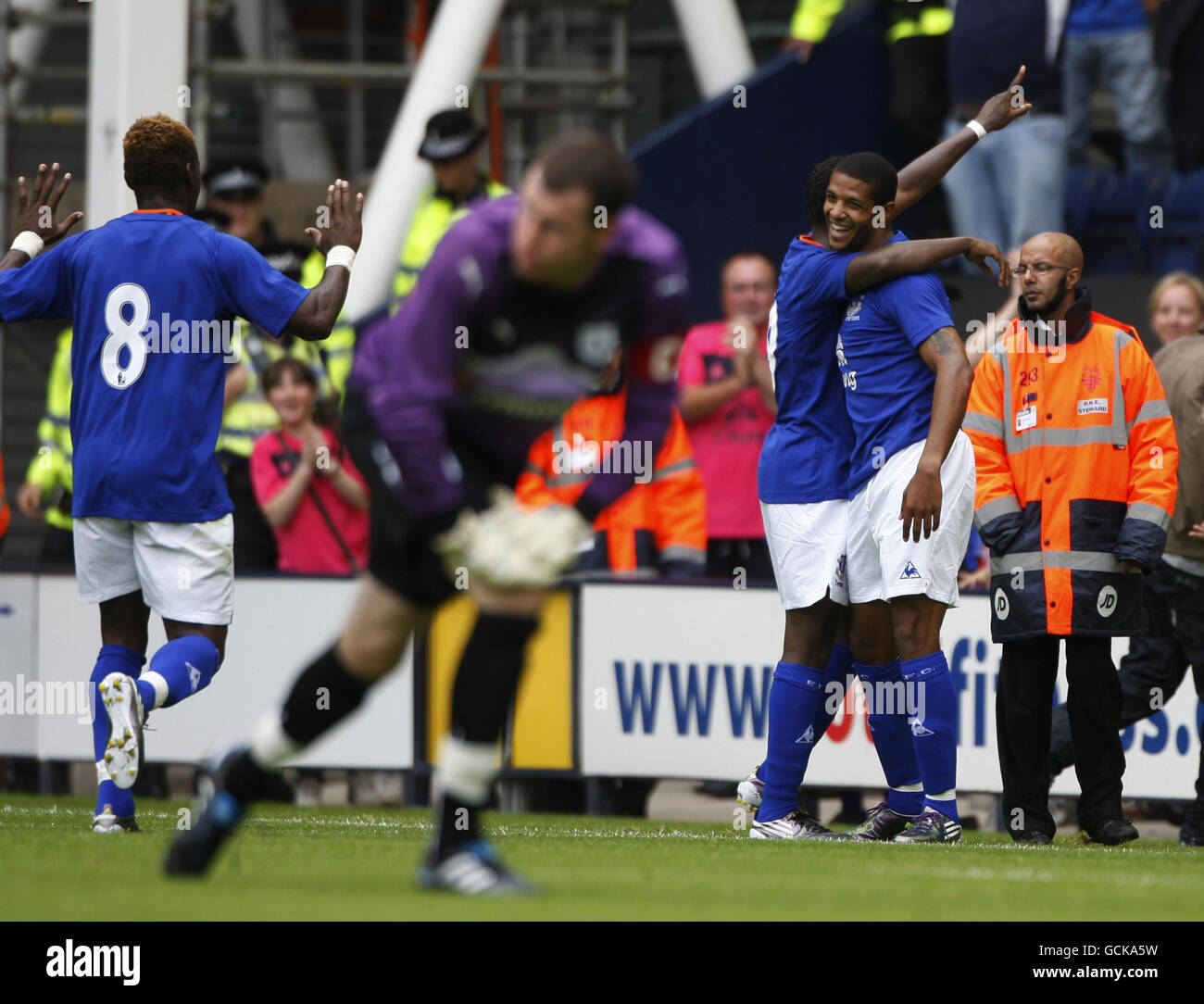 Everton's Jermaine Beckford (right) celebrates his opening goal against ...