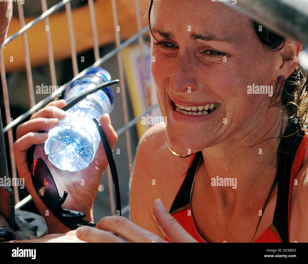 Germany's Melanie Seeger shows emotion in the heat after finishing the ...