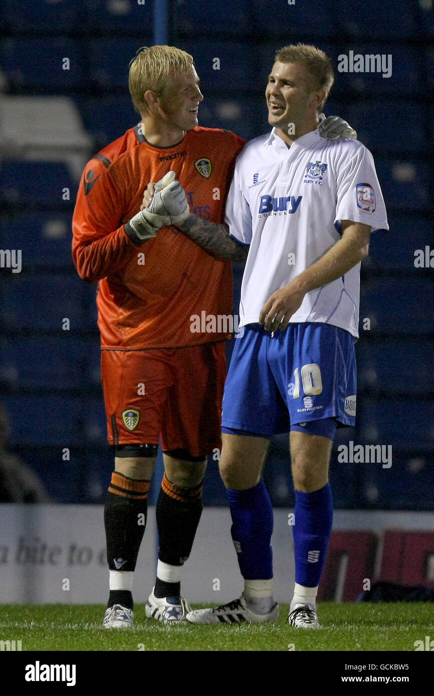 Leeds United's goalkeeper Kasper Schmeichel (left) and Bury's Andy ...