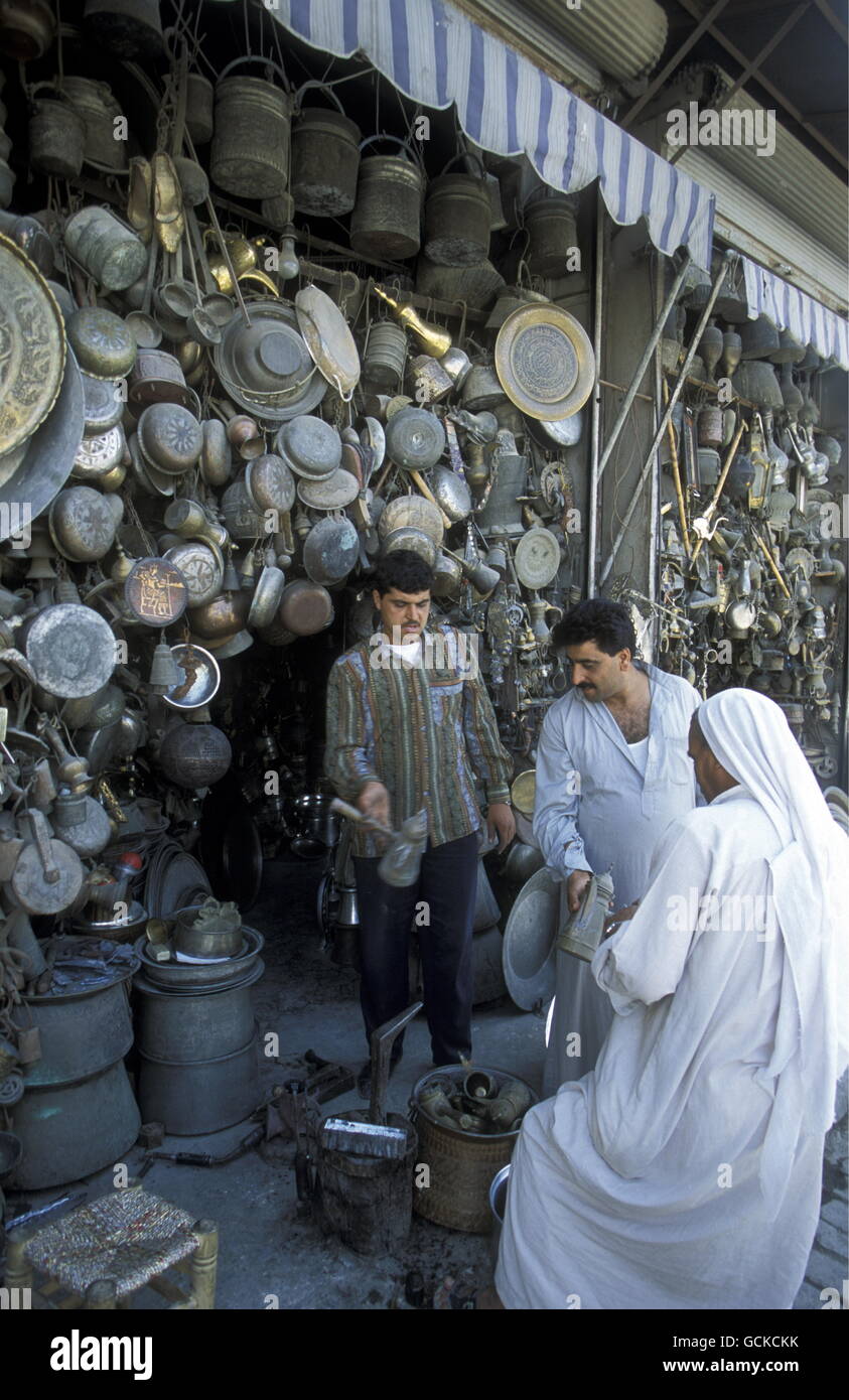 shops in the market or souq in the old town in the city of Aleppo in Syria in the middle east ...