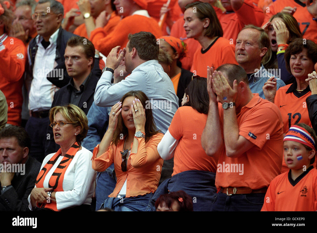 Dutch fans despair as their team lose to Italy in a penalty shoot out ...