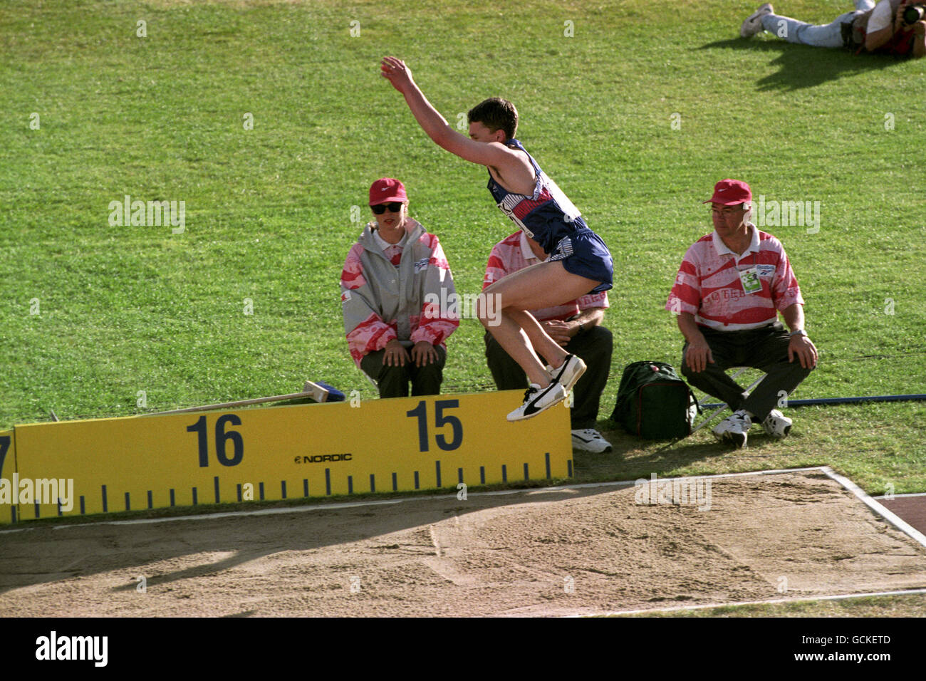 Great Britain's Jonathan Edwards breaks the world record by jumping 18. ...