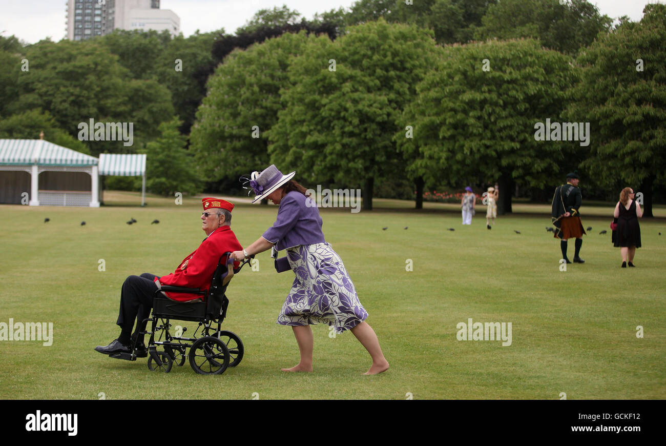 Guests explore the garden at the Not Forgotten Association Garden Party ...