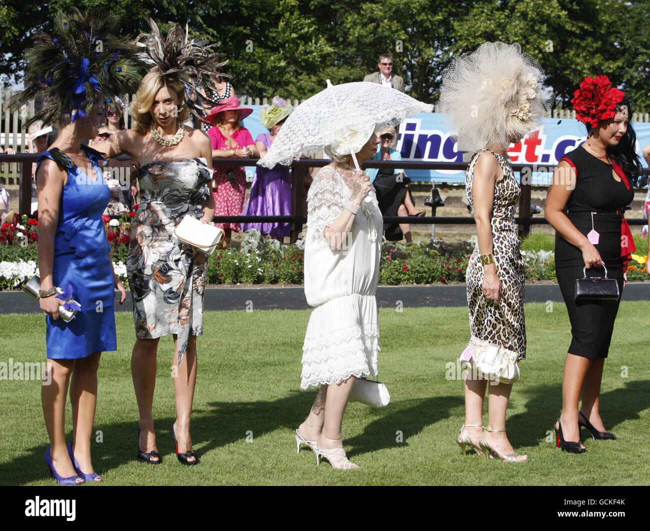 Ladies line up for the best dressed competition on Ladies day during ...