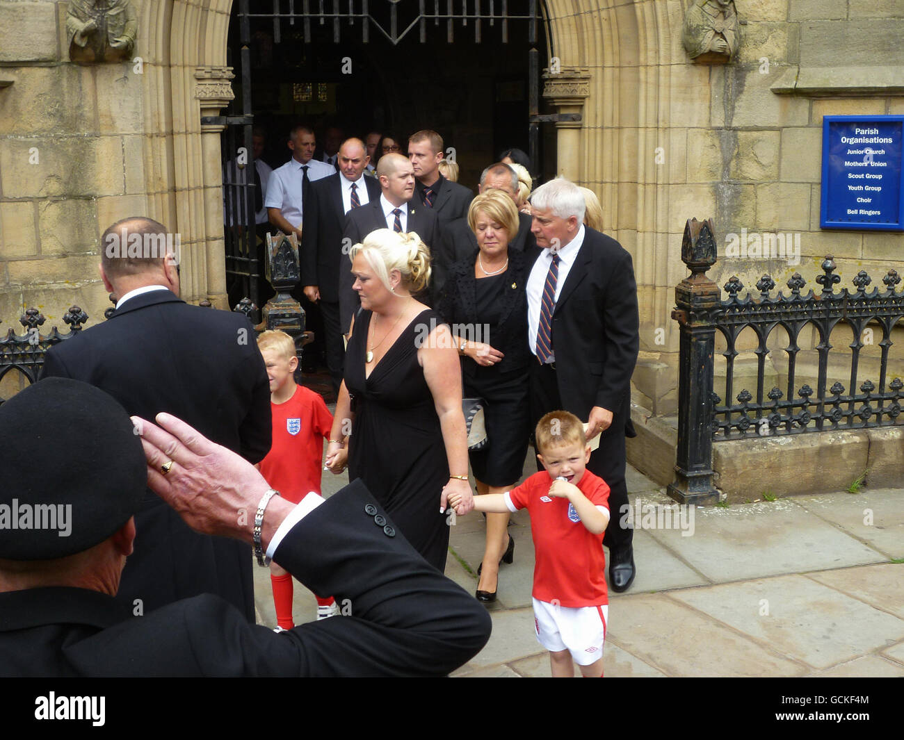 Kate Rowe leaves Wigan Parish Church following the funeral of her ...