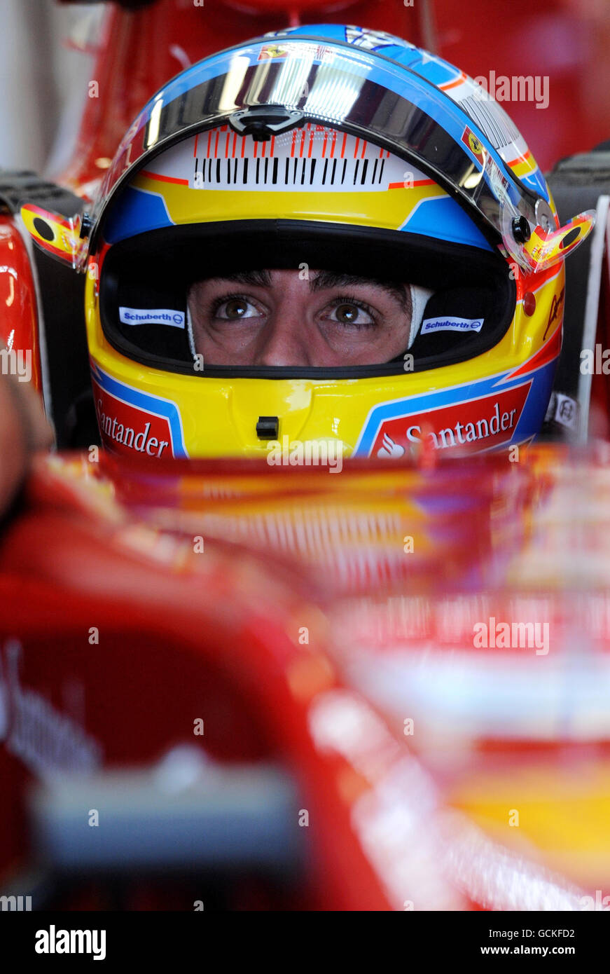 Ferrari's Fernando Alonso in the garage before the first practice ...
