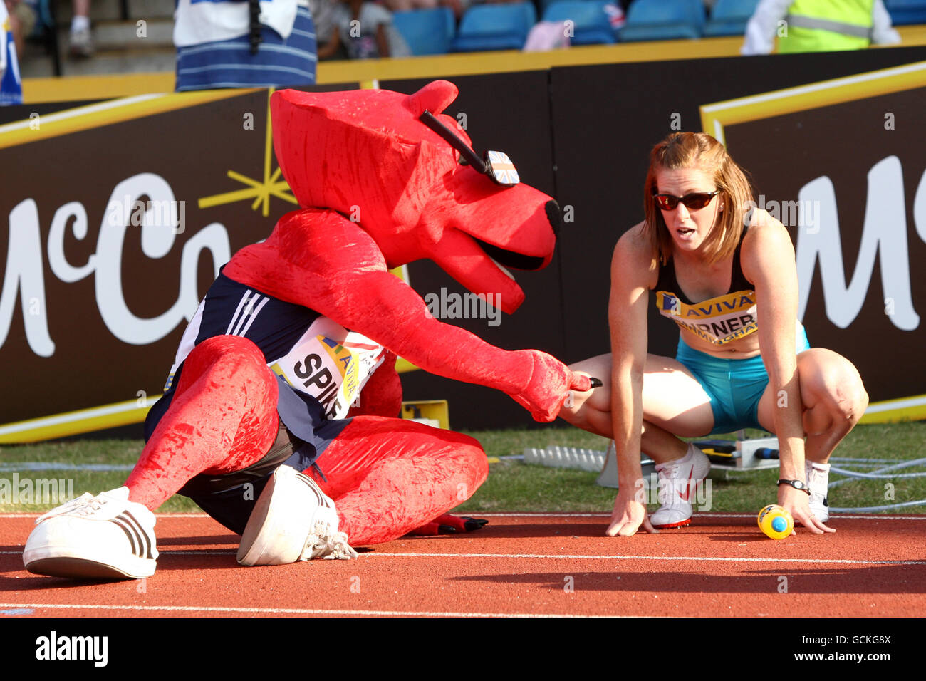 Laura Turner (right) with mascot Spike (left) after winning the Womens ...