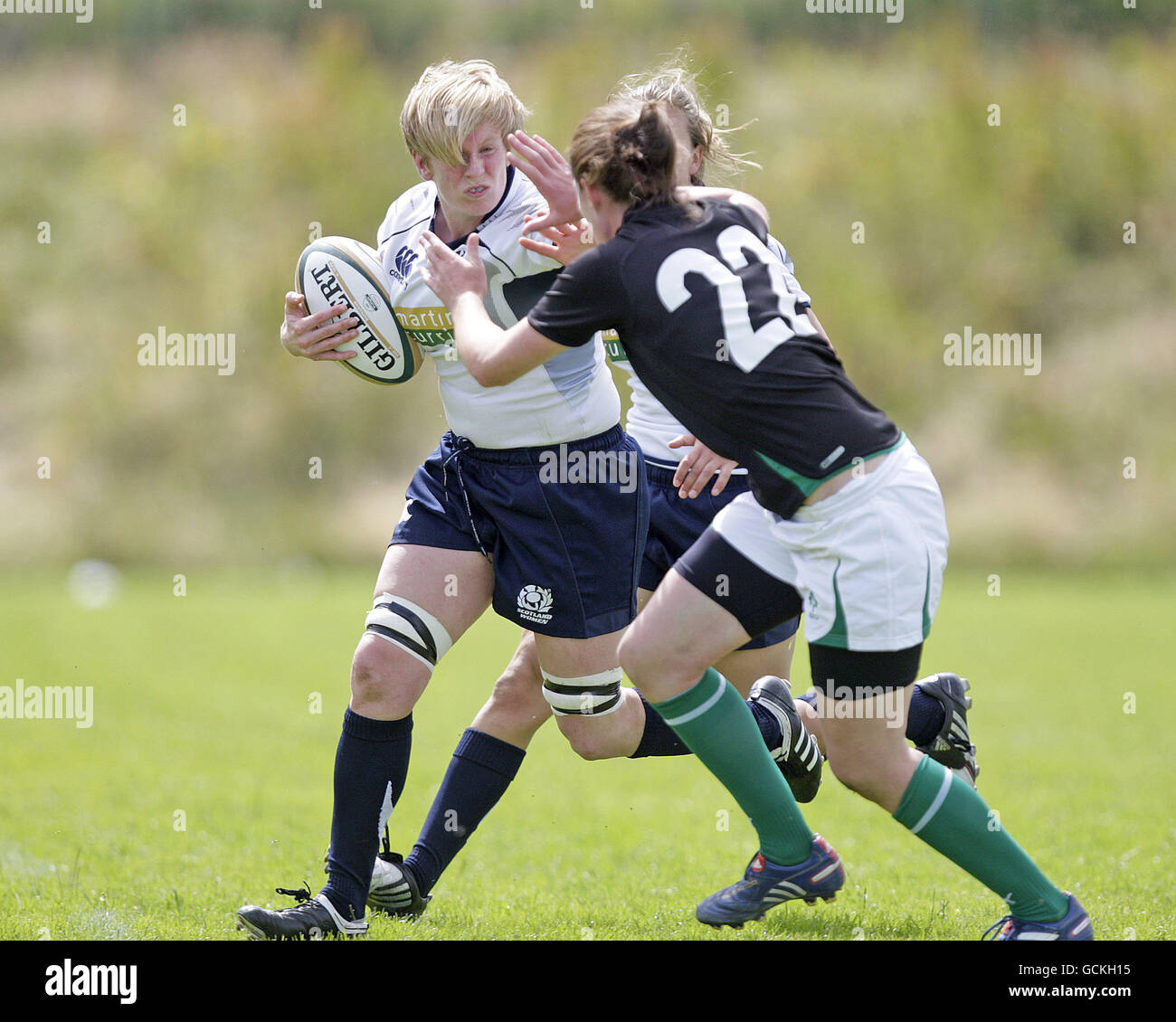 Scotland's Lynne Reid (left) is tackled by Ireland's Nora Stapleton ...
