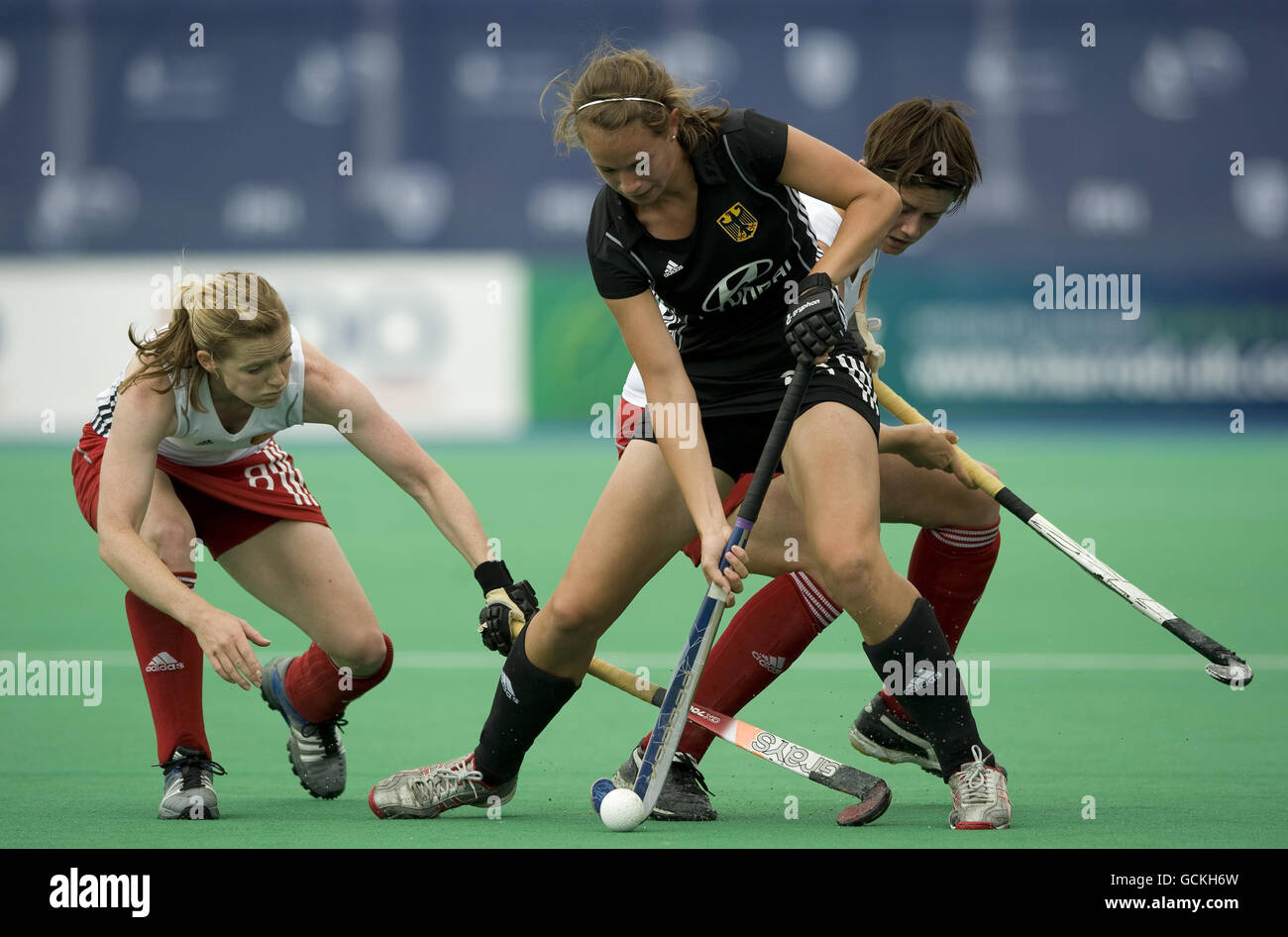 England's Helen Richardson (left) and Sally Walton challenge with ...