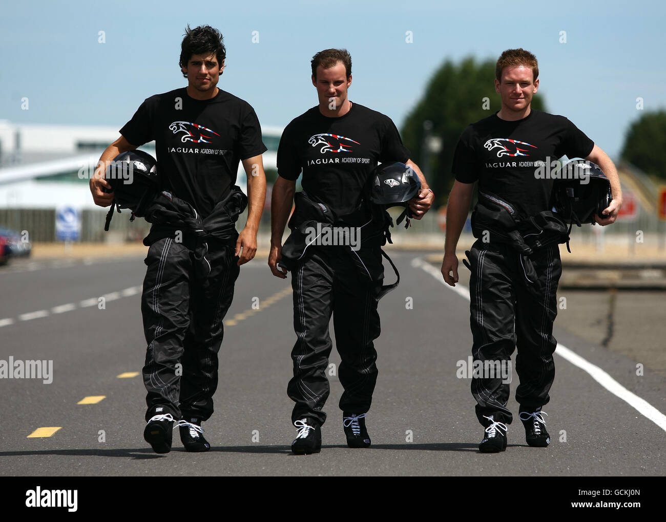 England cricketers Andrew Strauss (centre), Alastair Cook (left) and ...