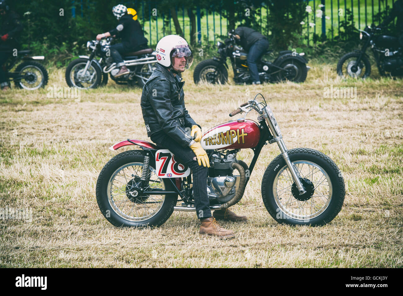 Motorcyclist riding a custom Triumph motorcycle at Malle, The Mile ...
