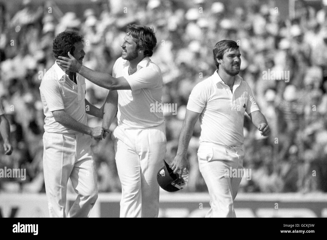 England's Ian Botham is congratulated by teammate Wayne Larkins after ...