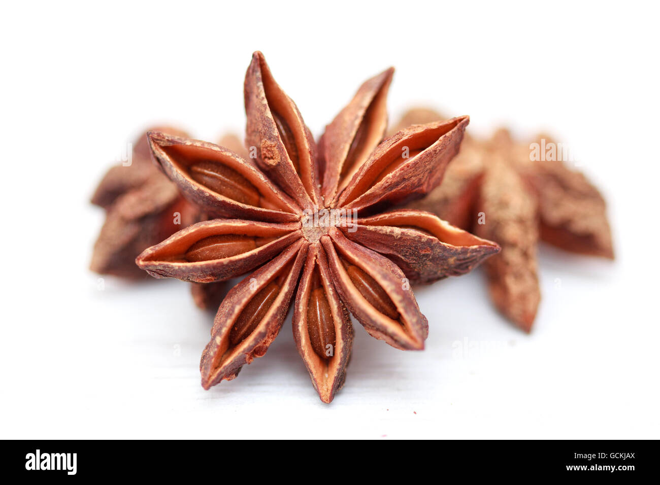 Stars of anise isolated on white background Stock Photo - Alamy