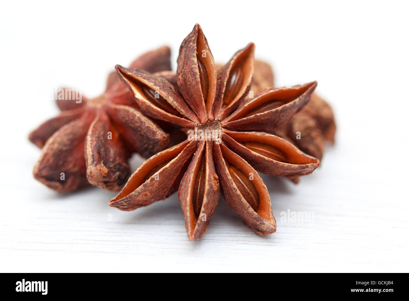 Stars of anise isolated on white background Stock Photo - Alamy