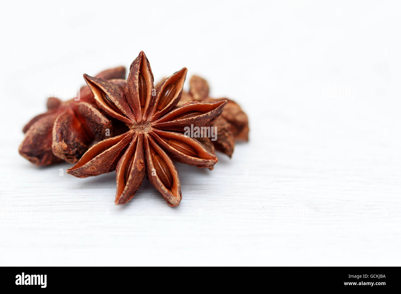 Stars of anise isolated on white background Stock Photo - Alamy