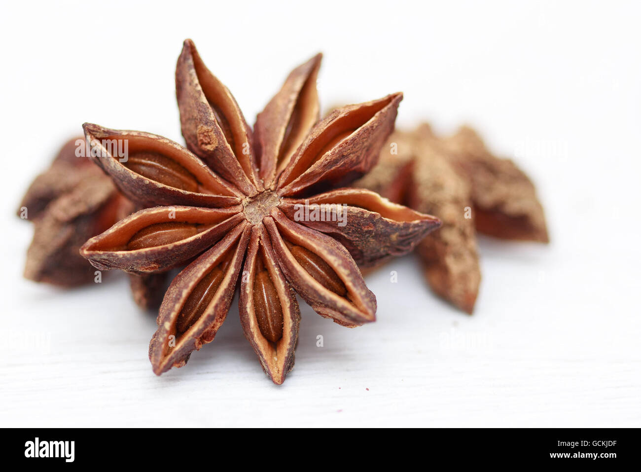Stars of anise isolated on white background Stock Photo - Alamy