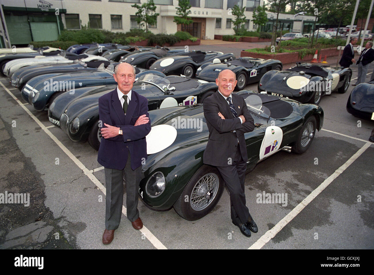 Former Jaguar drivers Jack Fairman (l) and Stirling Moss stand with 15 ...