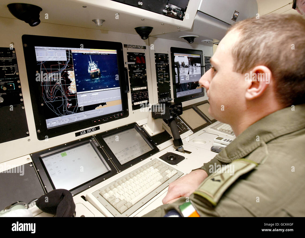 A camera operator in a CASA Maritime Patrol Aircraft at Baldonnel ...