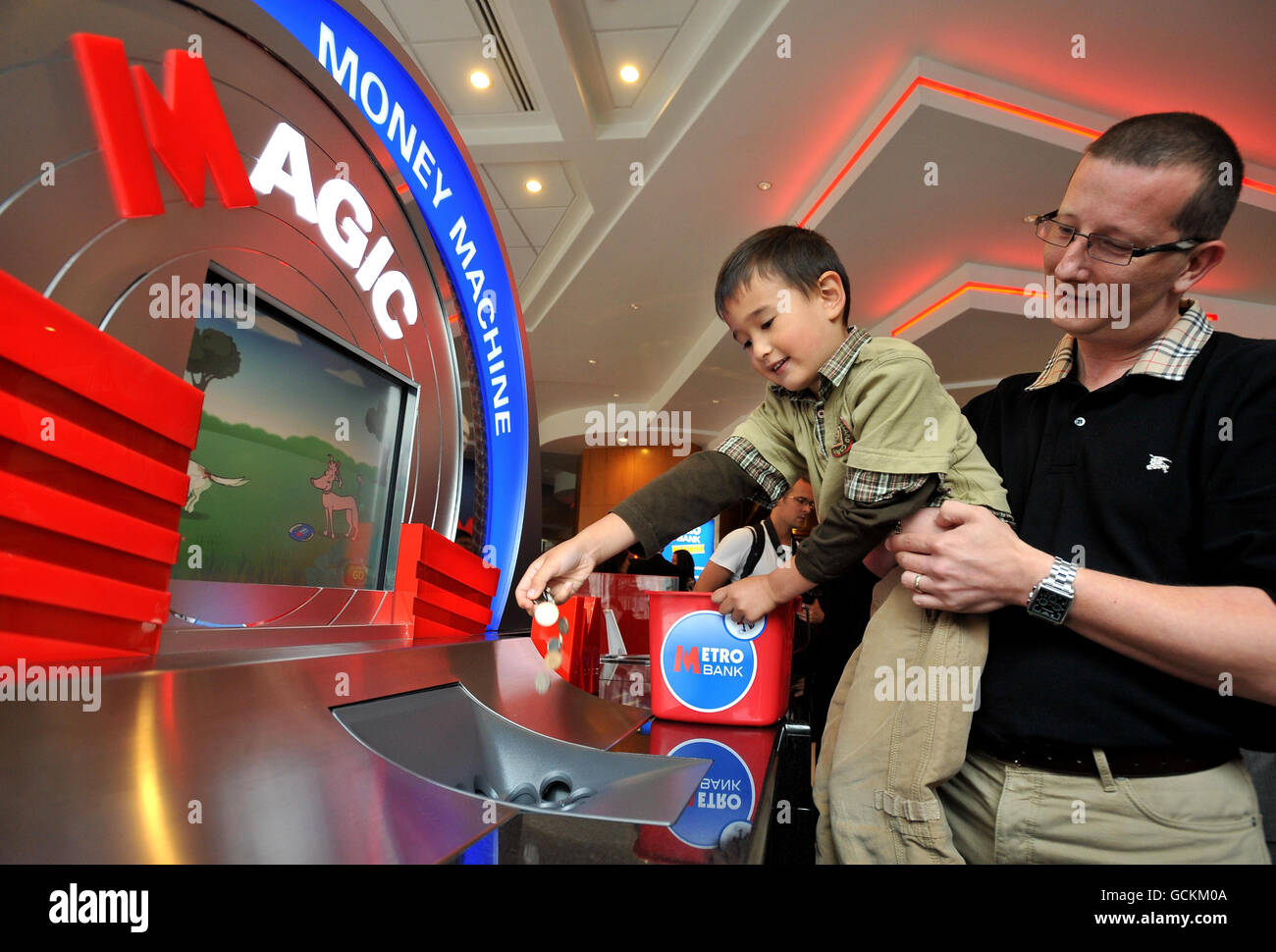 Stuart mcmanus holds his son joshua hi-res stock photography and images ...