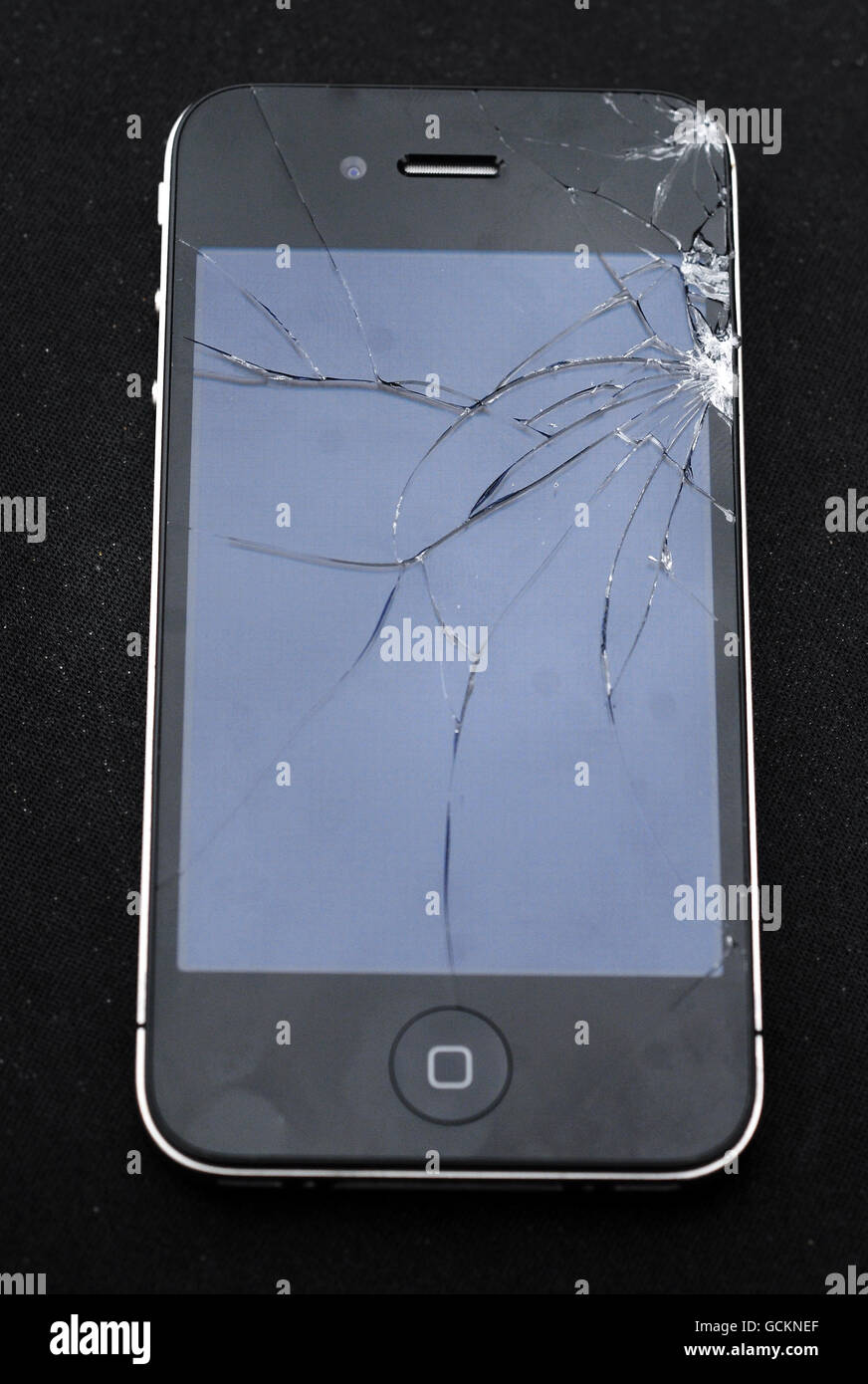 An iphone 4 with a cracked screen hi-res stock photography and images ...