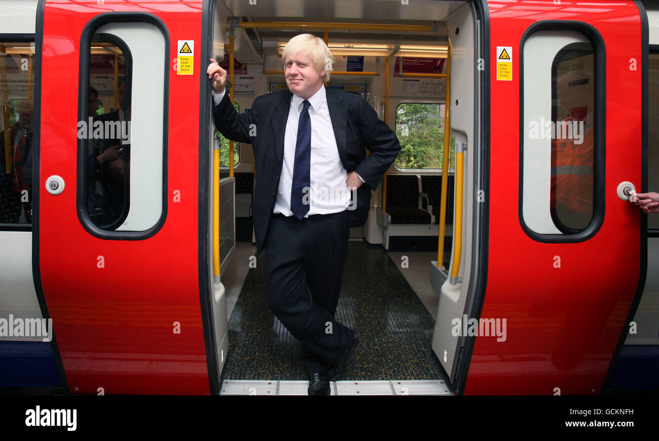 London Mayor Boris Johnson stands in the door of the first new air ...