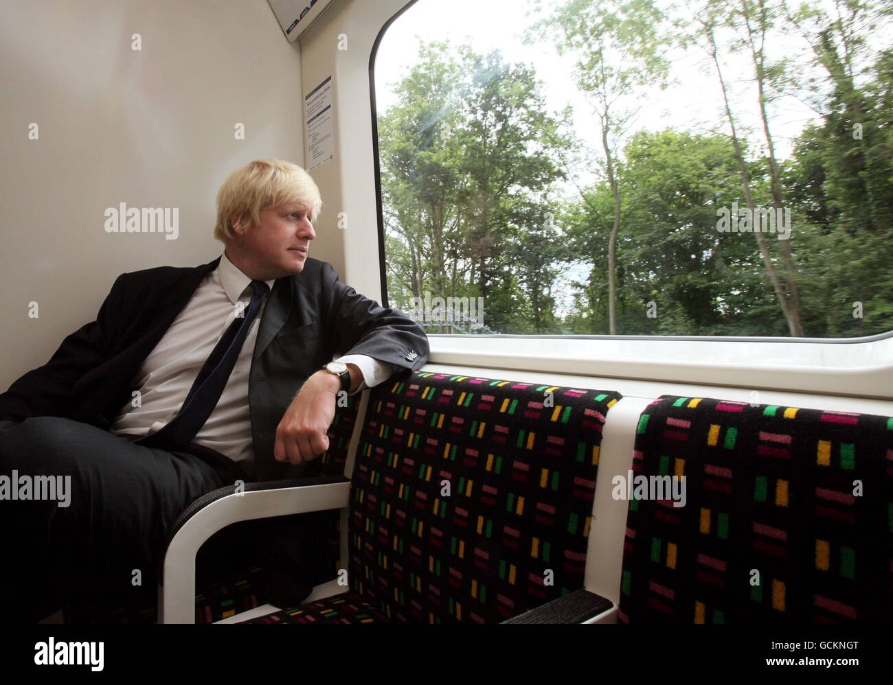 London Mayor Boris Johnson inside the first new air-conditioned train ...