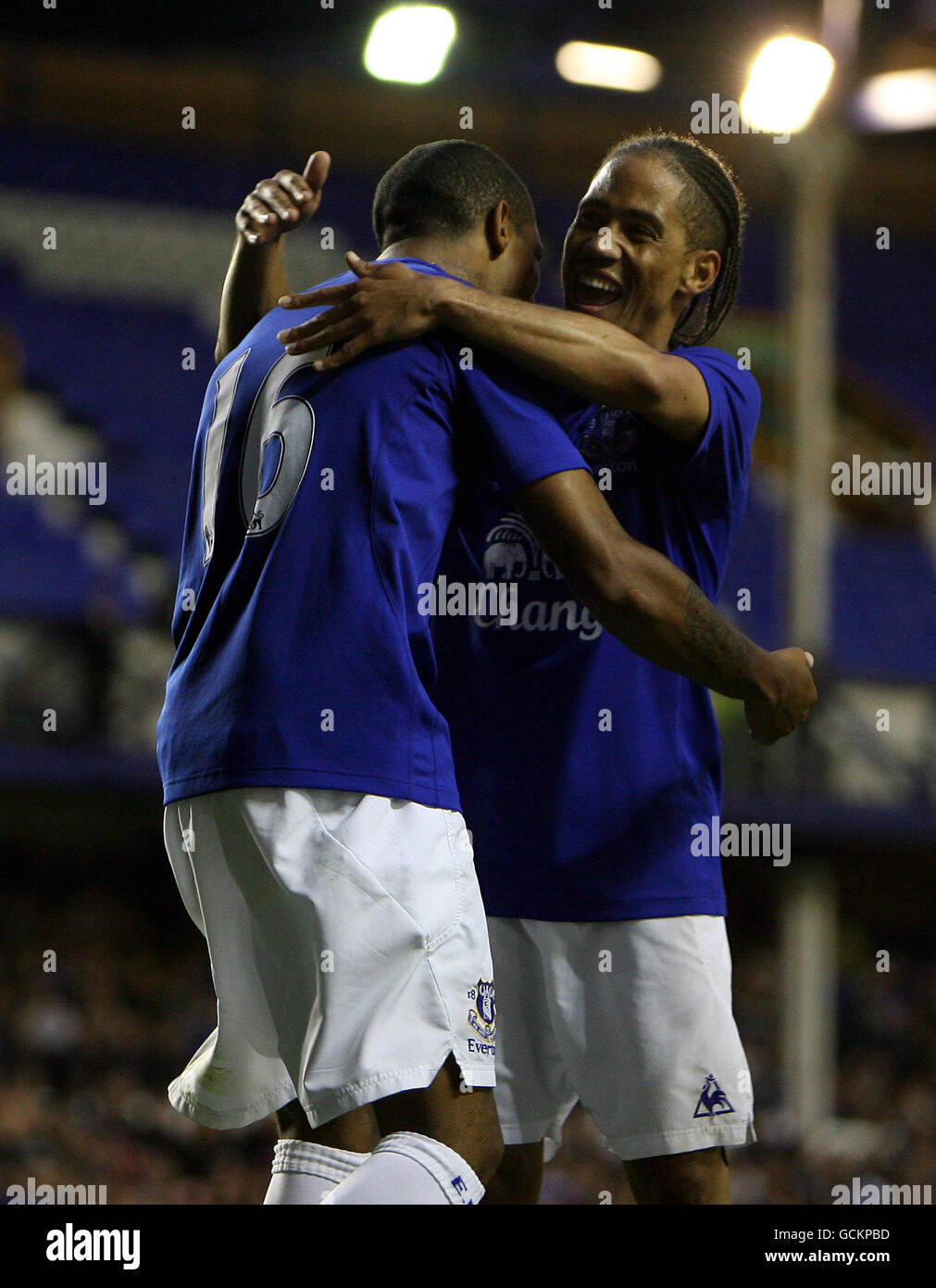 Everton's Jermaine Beckford (L) celebrates scoring his sides first goal ...