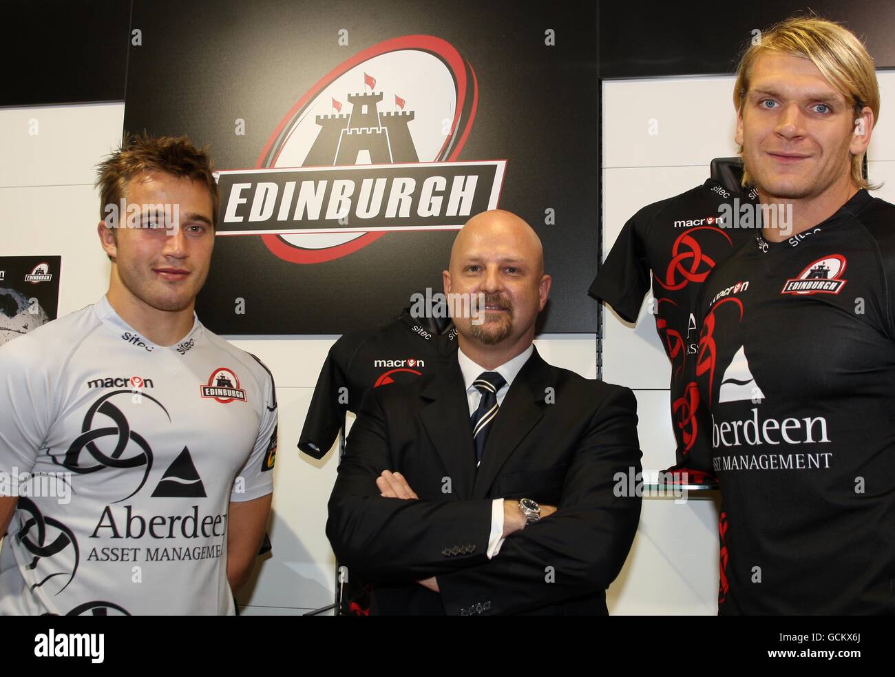 Edinburgh's Alex Grove wearing the away kit, Macron's Fabio Malipiero ...