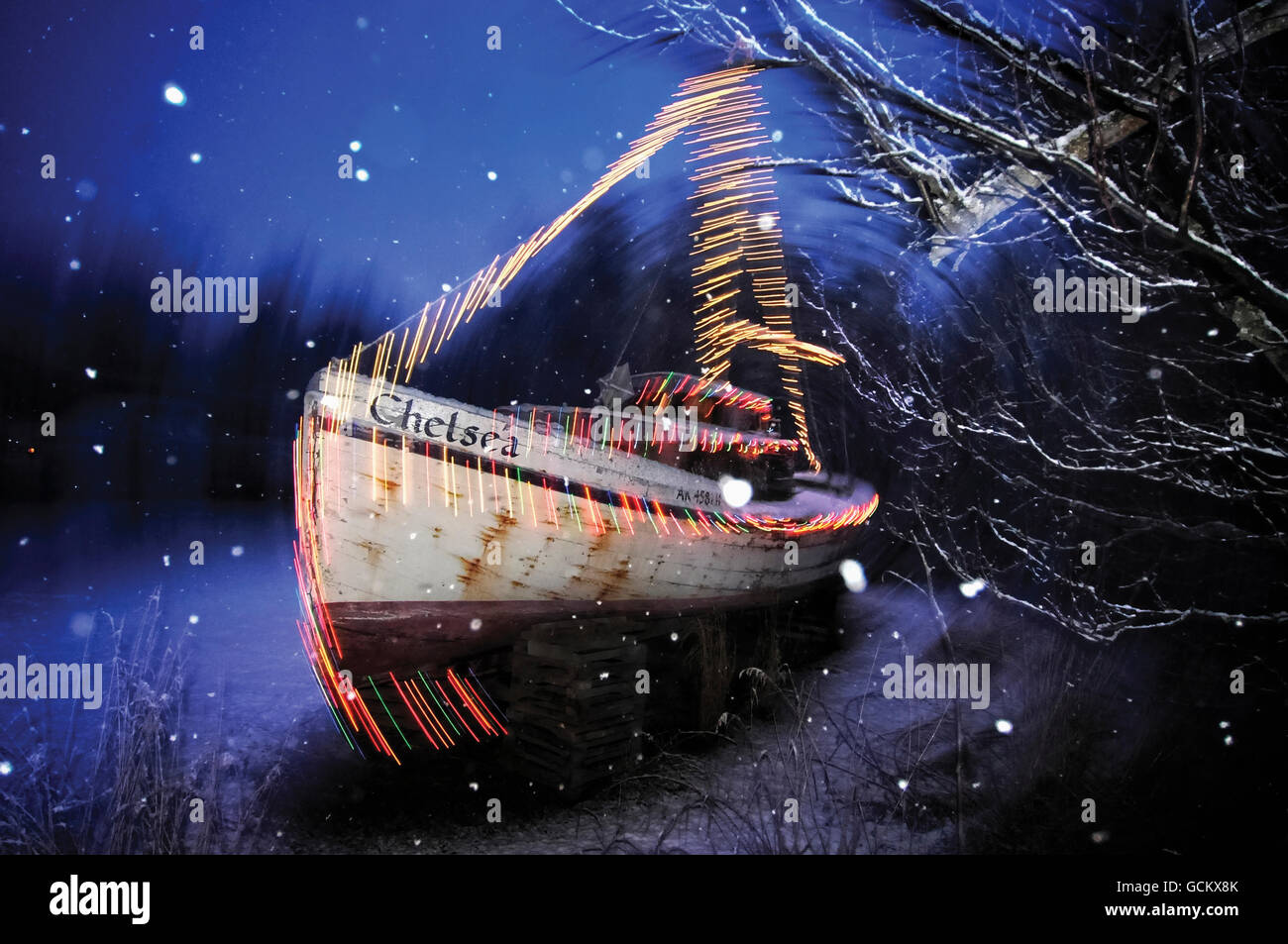 The Chelsea, a double-ender boat is outlined in Christmas lights during ...