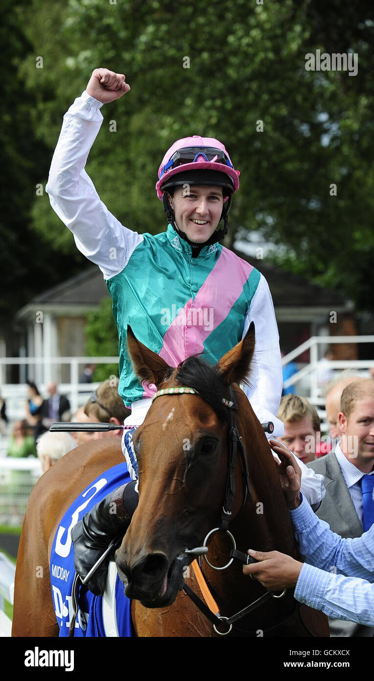 Jockey Tom Queally celebrates on Midday after their win in the Darley ...