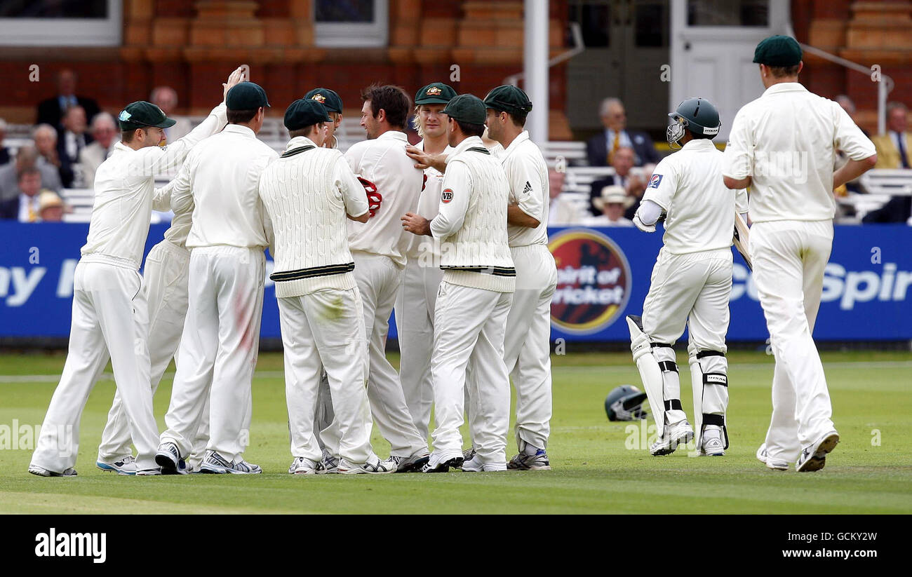 Australia celebrate the wicket of Azhar Ali who was bowled by Ben ...