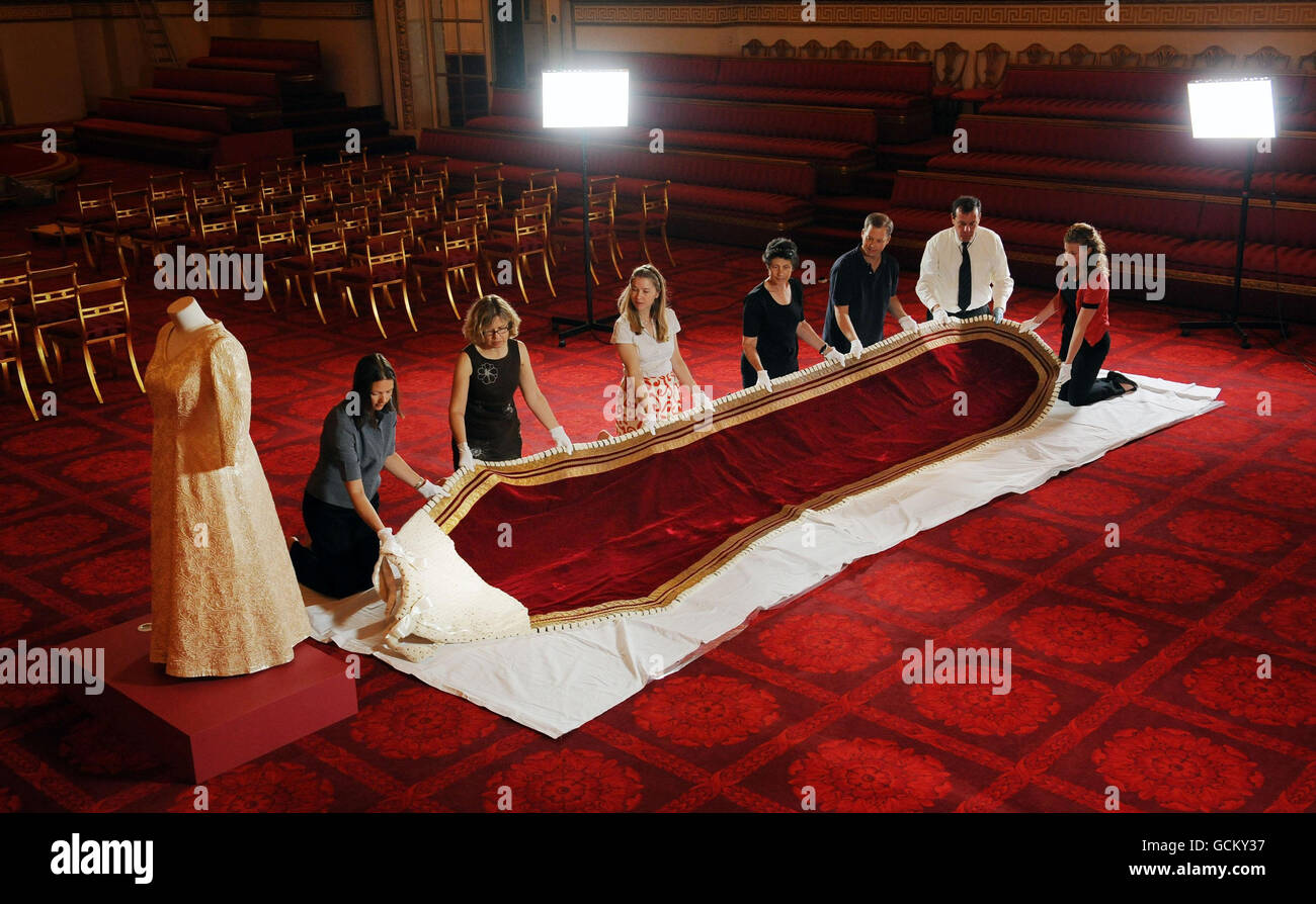 Royal Collection staff with Queen Elizabeth II's Robe of State in the ...
