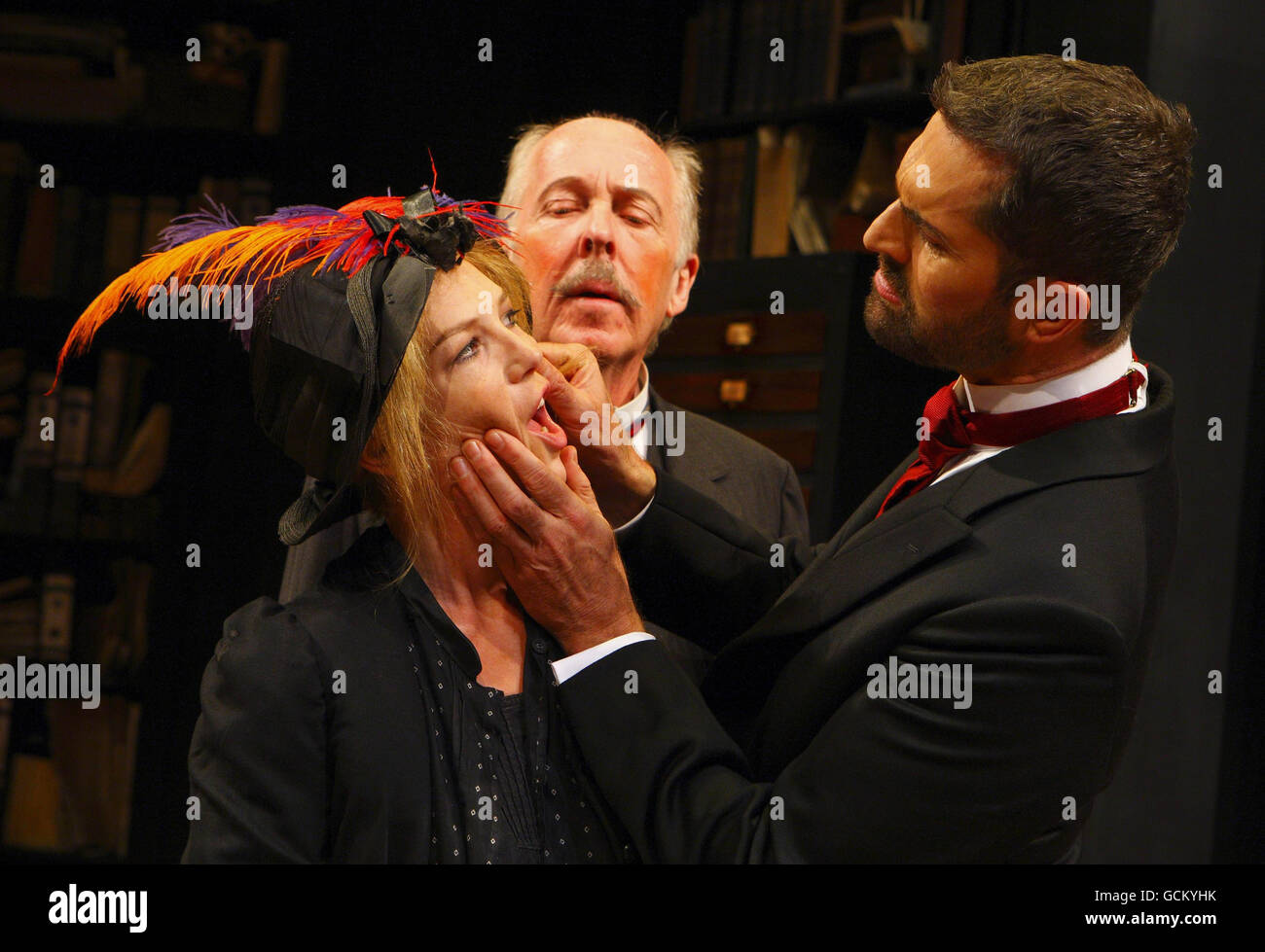 Rupert Everett as Professor Henry Higgins (right), Peter Eyre as ...