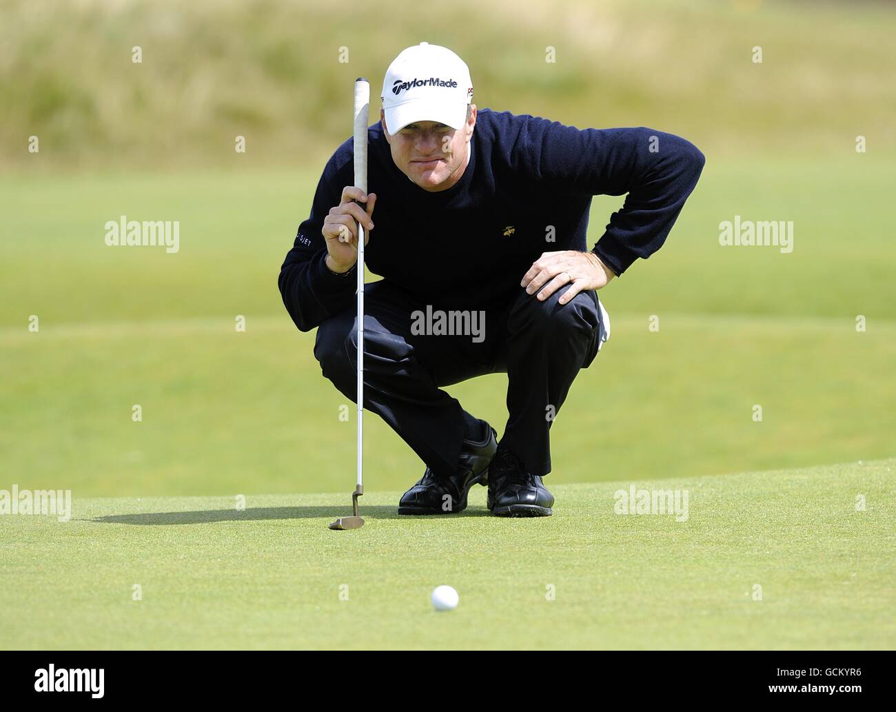 USA's Scott Verplank lines up a putt during round two of The Open ...