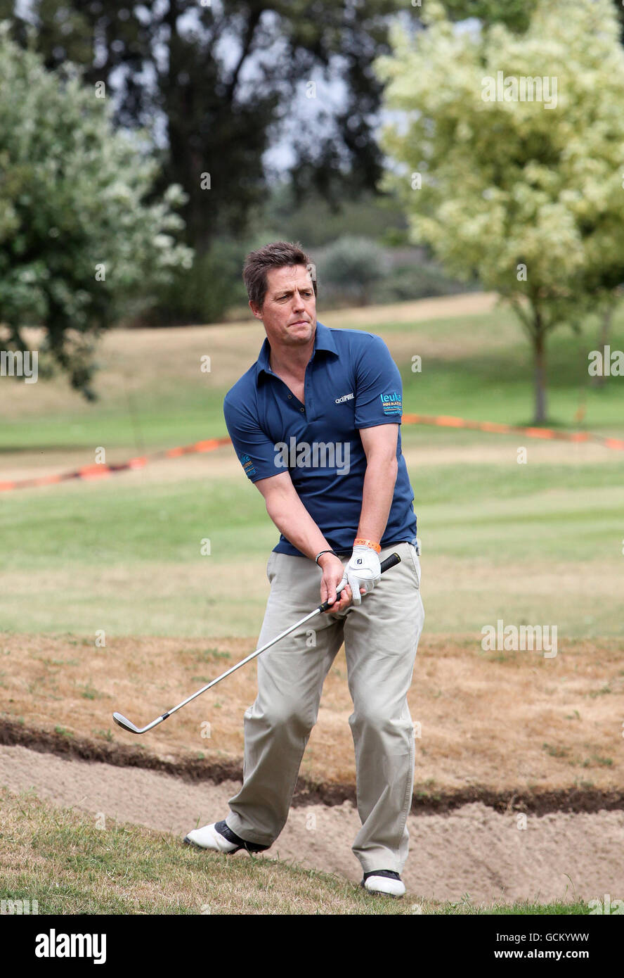 Hugh Grant plays in the Leuka Mini Masters golf tournament at Dukes ...