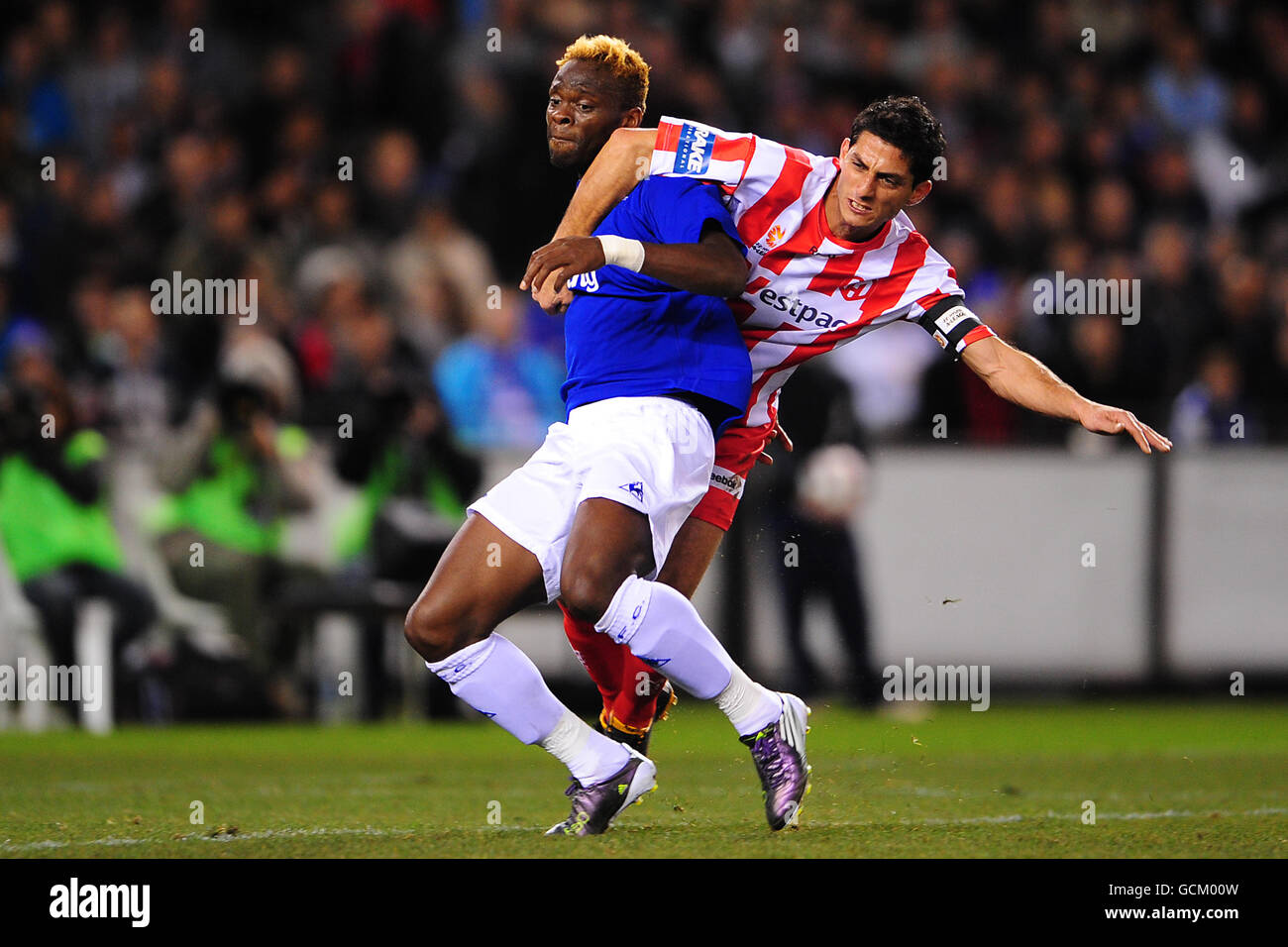 Everton's Louis Saha (left) and Melbourne Heart's Simon Colosimo (right ...
