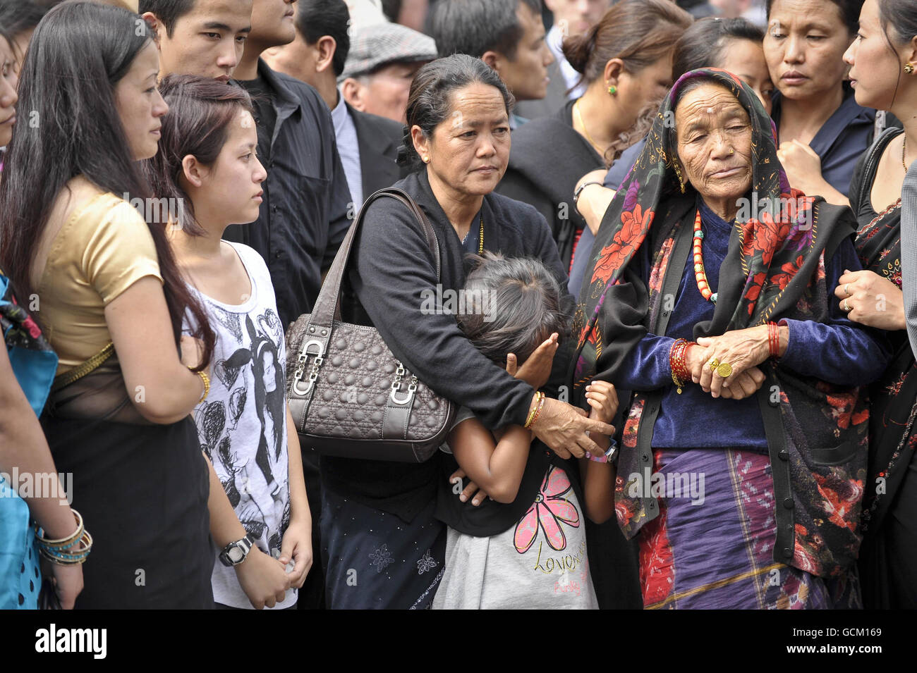 Eight year old Eva Pun, (centre) daughter of Corporal Arjun Pun, who ...