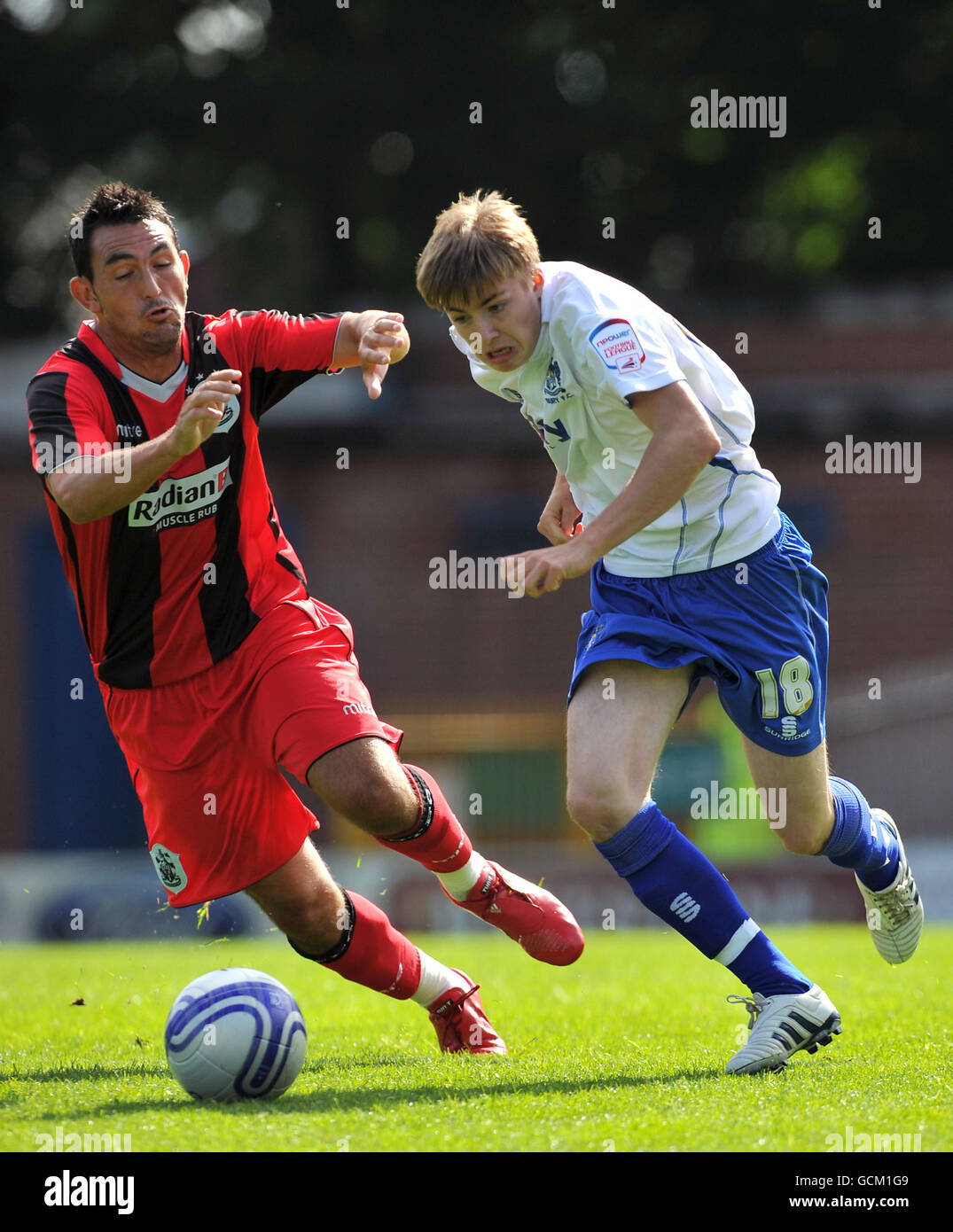 Huddersfield Town's Gary Roberts (left) and Bury's Max Harrop battle ...