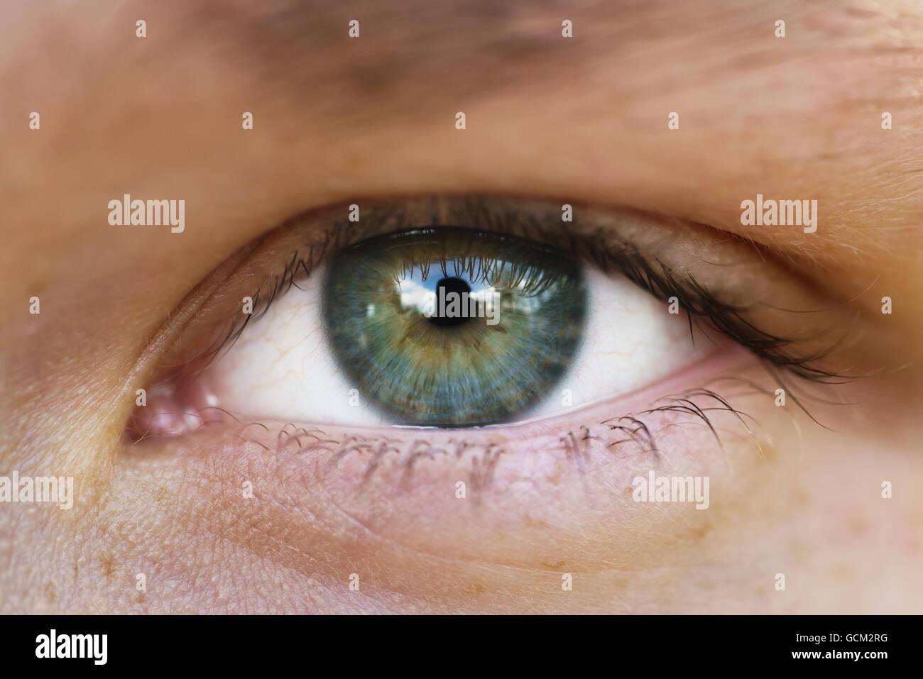green teen girl eye closeup front view outdoor Stock Photo - Alamy