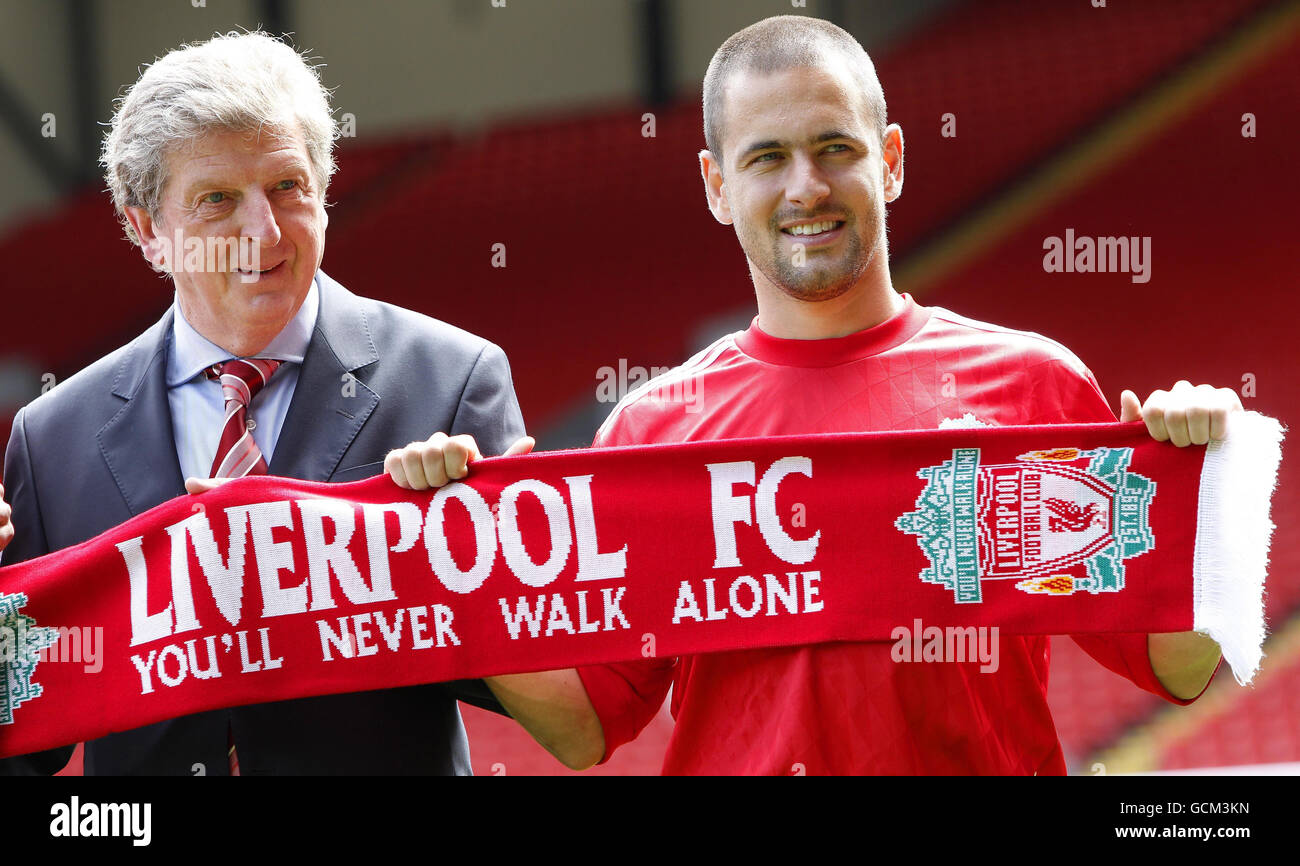 Liverpool's new signing Joe Cole and manager Roy Hodgson (left) during ...