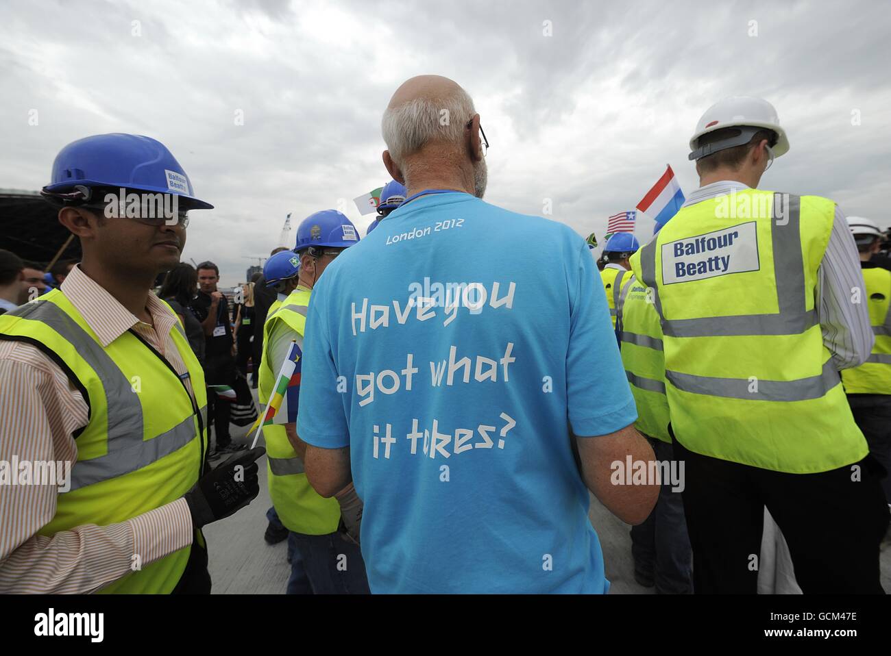 A man wears a T-shirt appealing for volunteers to help at the London ...