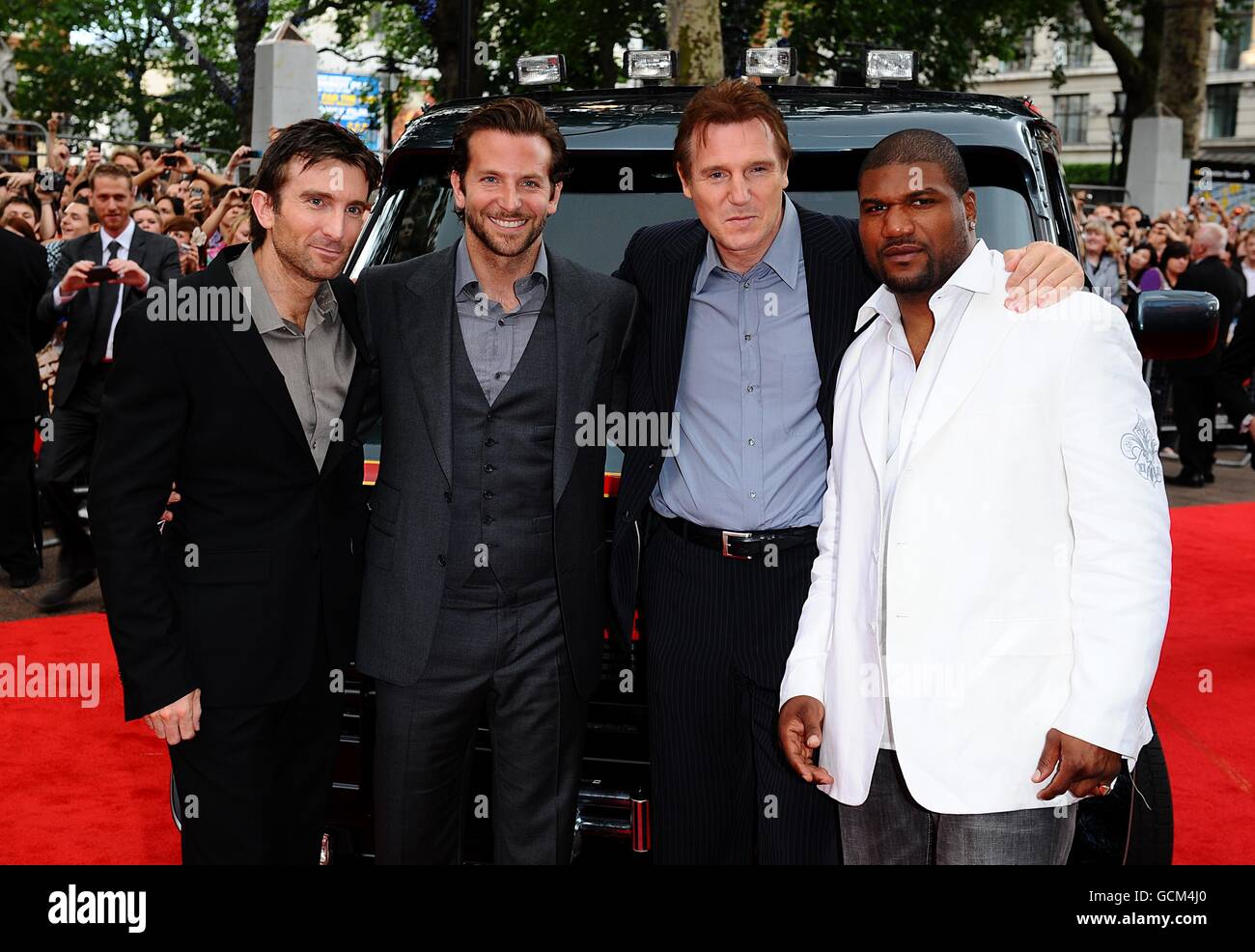 The stars of the film (L-R) Sharlto Copley, Bradley Cooper, Liam Neeson ...