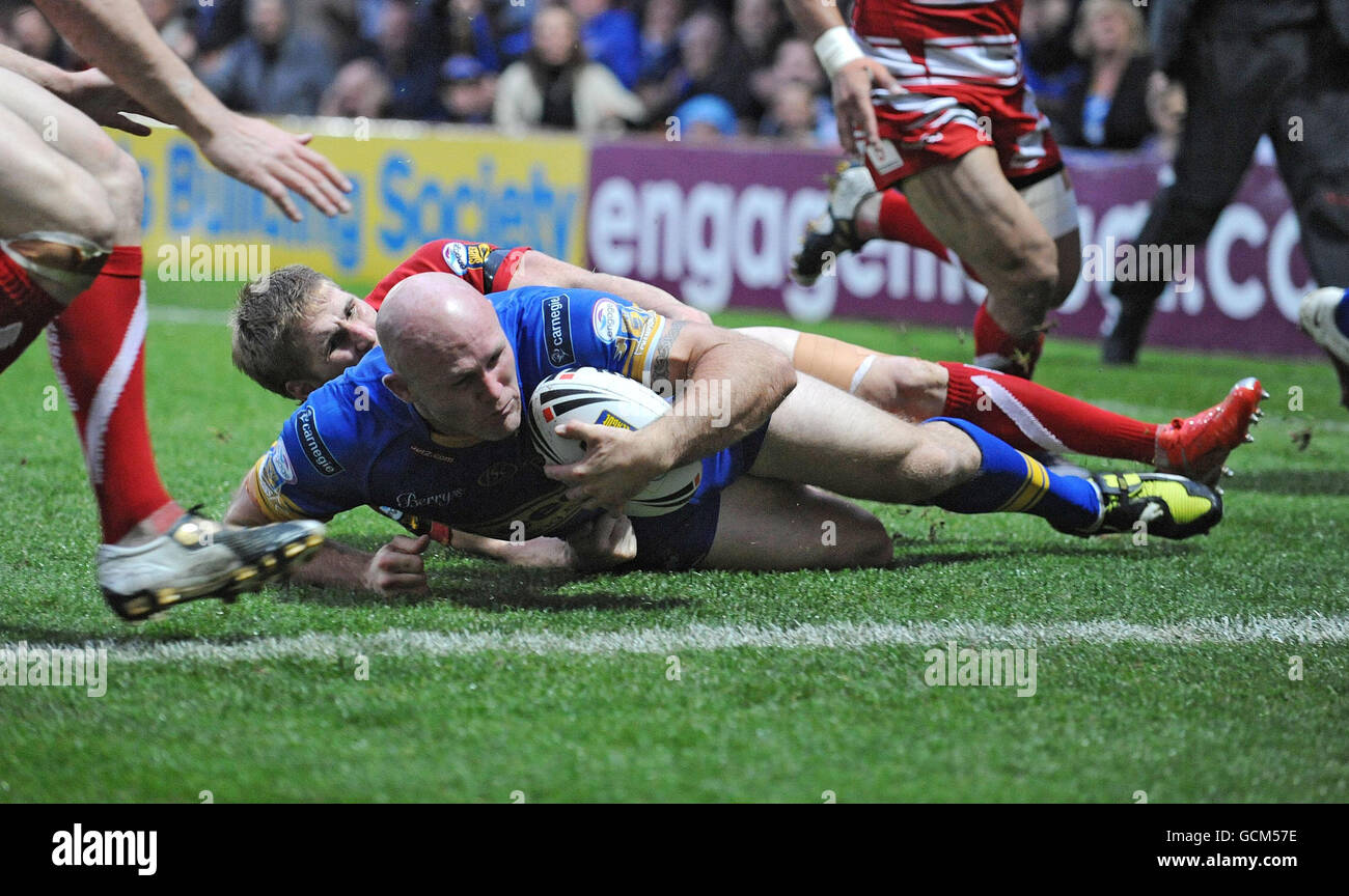 Leeds Rhinos's Keith Senior goes over to score a try under pressure ...