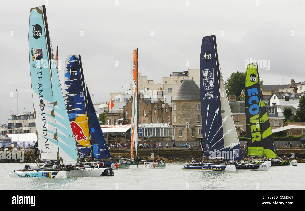 The fleet of Extreme 40 catamarans get the first race underway in light ...