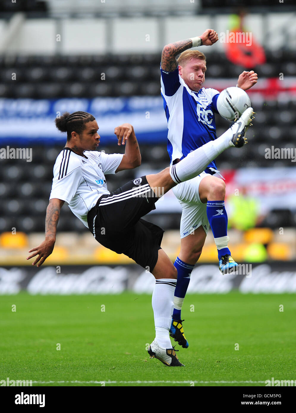 Derby County's Dean Leacock (left) and Birmingham City's Gary O'Connor ...